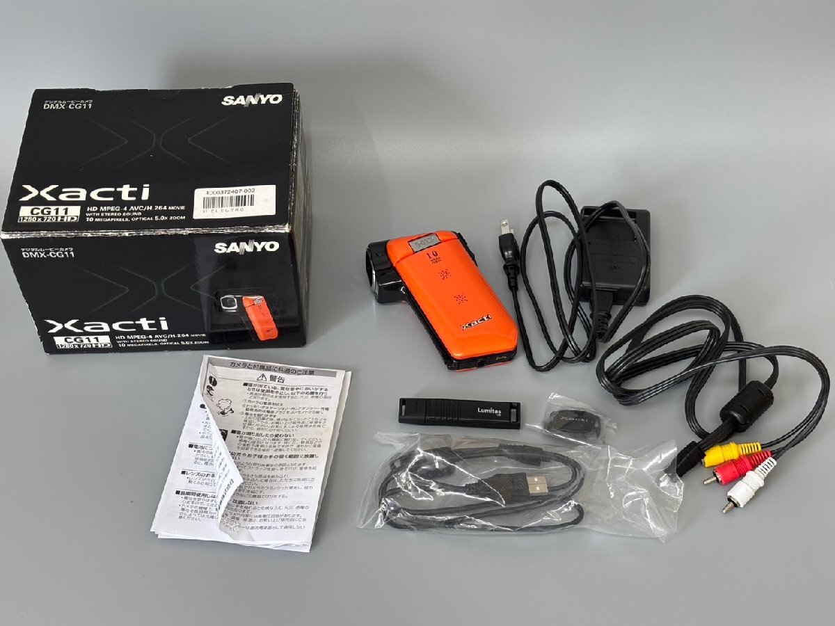 1円～ SANYO サンヨー Xacti DMX-CG11 デジタルムービーカメラ オレンジ /【Buyee】 Buyee - Japanese Proxy Service | Buy ...
