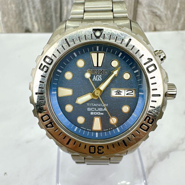 A2411-5-36 1円スタート 稼働品 自動巻き SEIKO AGS セイコースキューバ メンズ腕時計 シルバー 青文字盤 チタニウム ...