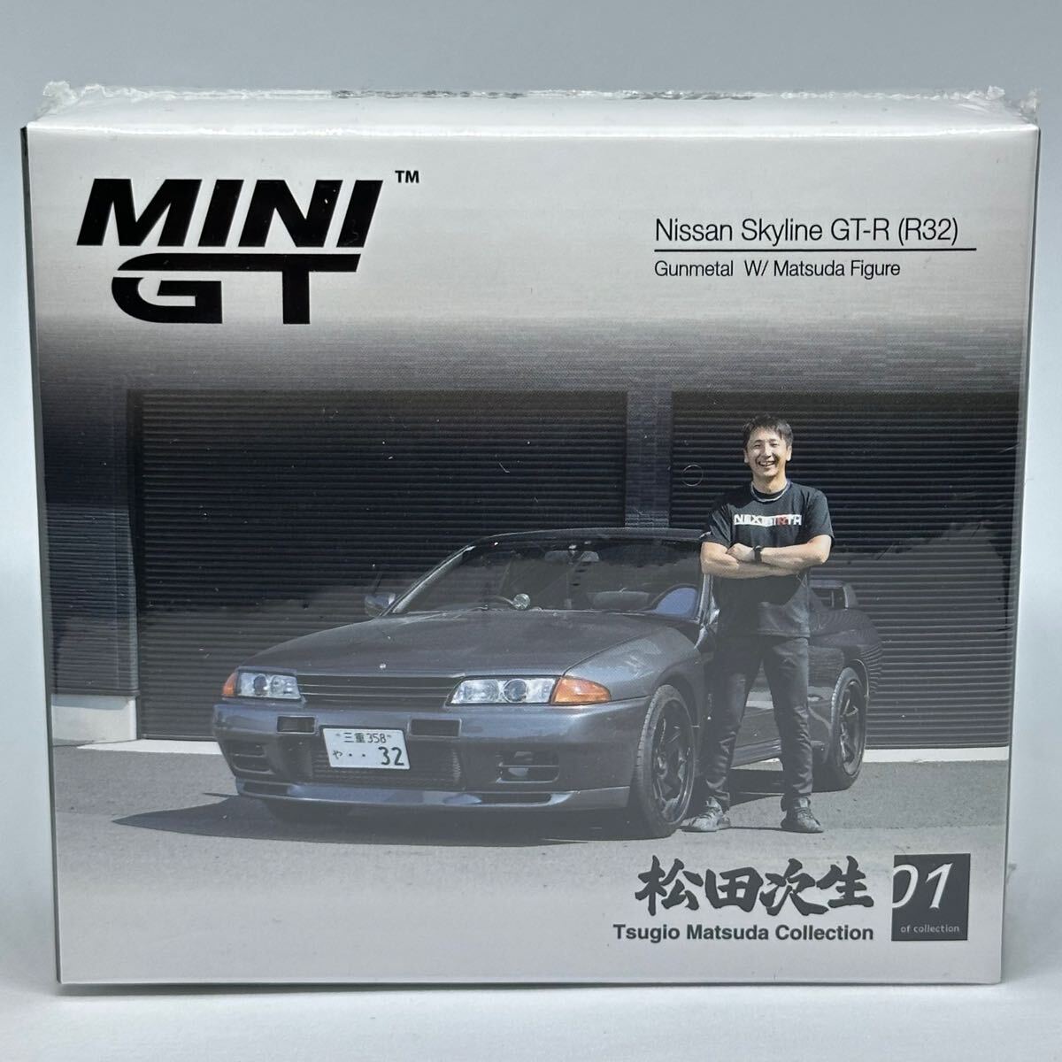 MINI GT Nissan Skyline GT-R (R32) Gunmetal W/ Matsuda Figure Tsugio ...
